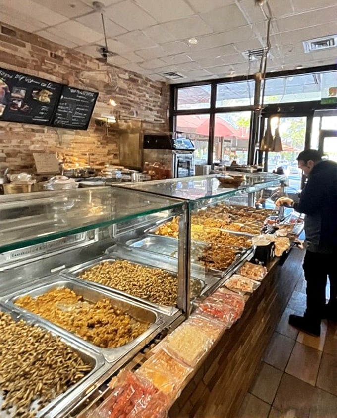 A buffet display that makes decision-making the hardest work you'll do all day – each tray promising its own delicious story.