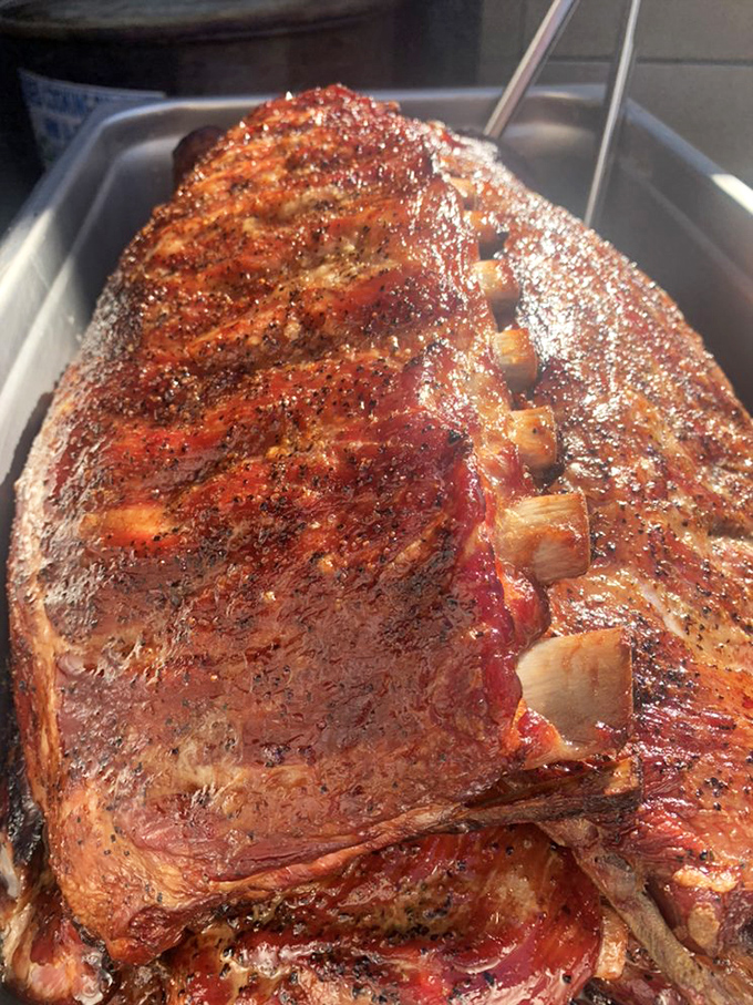 The full slab—barbecue's version of "go big or go home." That bark is the result of time, patience, and someone who understands the poetry of smoke.