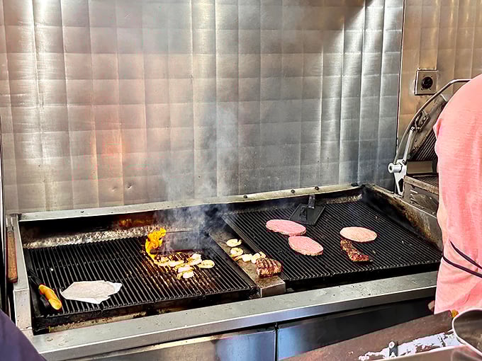 That grill is where the magic happens—a sizzling altar where raw potential transforms into the reason your diet starts "tomorrow."
