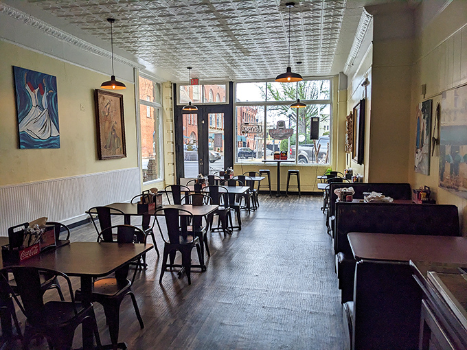 Local eateries blend historic architecture with casual comfort, creating gathering spots where food conversations flow as easily as sweet tea.
