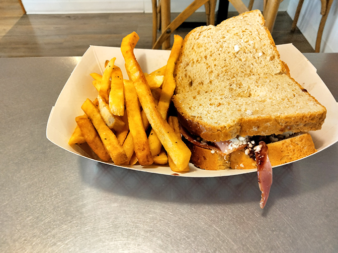 The sandwich that launched a thousand road trips. Those golden fries aren't just a side—they're the supporting actors who deserve their own award.