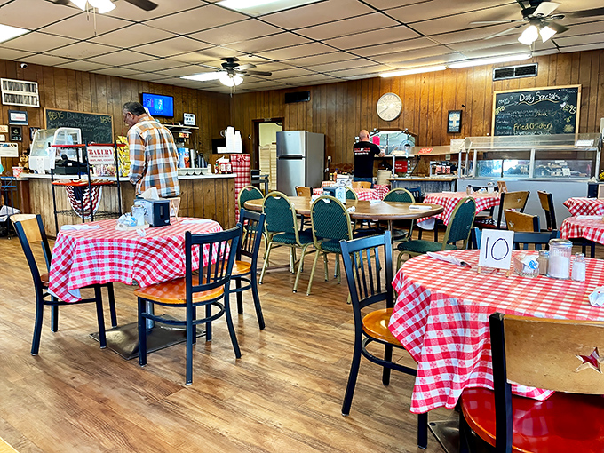 Tables numbered with handwritten cards, because you're not just a customer—you're sitting at a specific place in Town Cafe history.