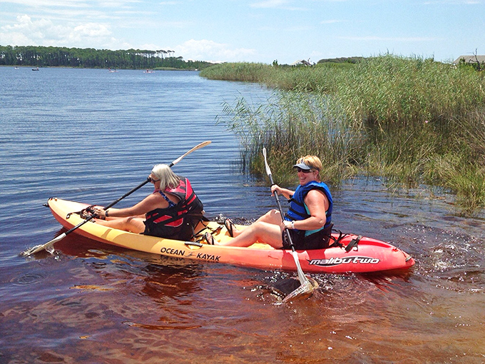 Kayaking Western Lake—where paddling through paradise makes you temporarily forget about that work email you didn't answer.
