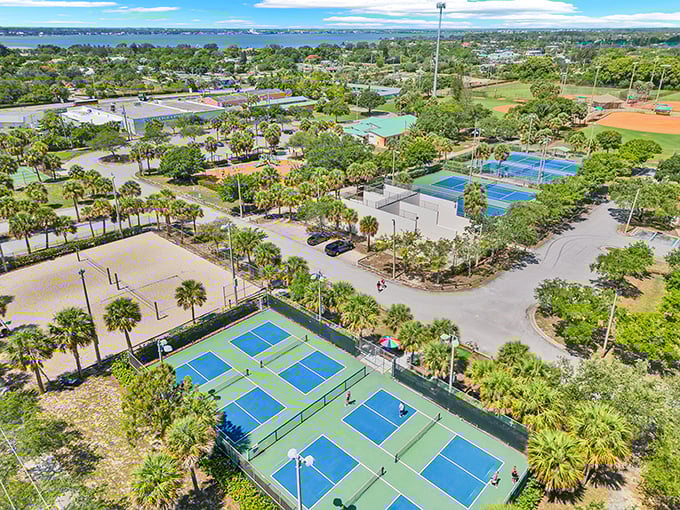 Recreation central, palm-tree style. Langford Park's courts and fields offer playgrounds for athletes while palms stand guard like leafy referees.