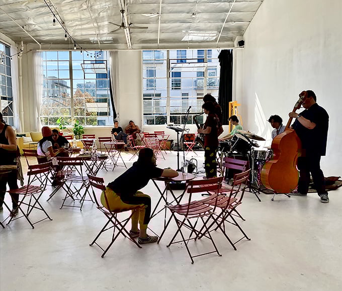 Even the musicians can't resist performing here—the acoustics are almost as good as the pastries.