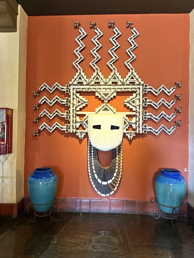 Native American-inspired art that watches over diners like a benevolent spirit. The perfect cultural backdrop for a meal that honors local traditions.