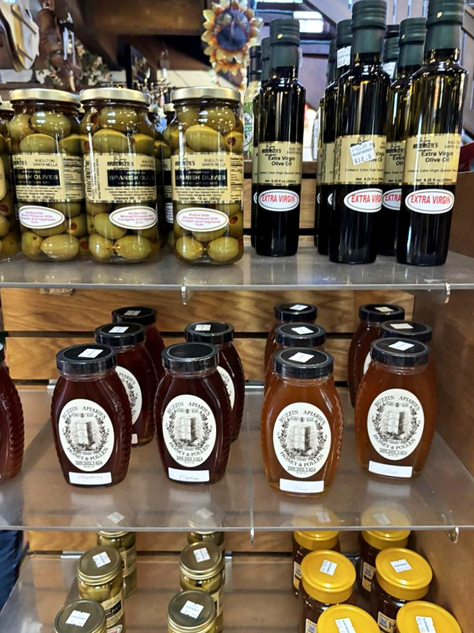 The gift shop shelves groan with gourmet temptations—local honey, olives, and specialty oils that somehow convince you that yes, you do need artisanal olive oil for the road.