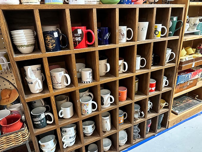 Mug shot gallery! Each cubby holds a different personality—from sassy slogans to vacation souvenirs—all waiting for their morning coffee close-up.