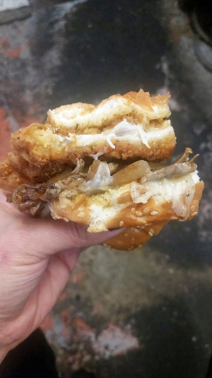 The chicken sandwich that refuses to be overshadowed by its beefy brethren—crispy, juicy, and demanding respect one bite at a time.
