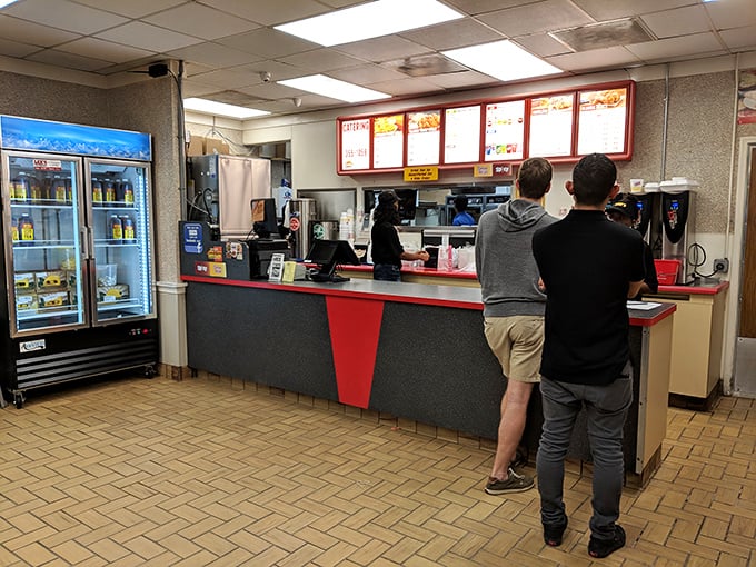 The order counter—where dreams are spoken aloud and then, miraculously, transformed into crispy reality within minutes.