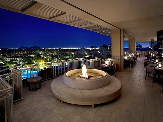 Fire and twilight create the ultimate Arizona moment. This patio doesn't just offer dinner with a view—it offers dinner with a standing ovation from Mother Nature herself.