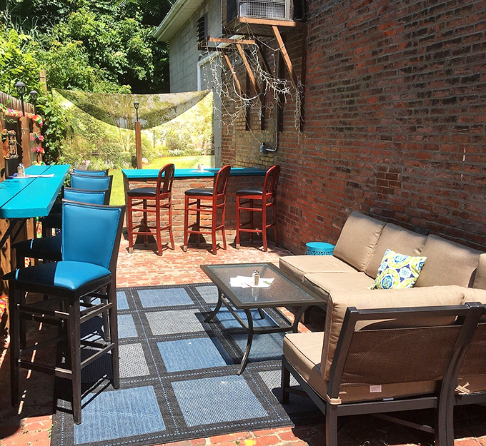 The outdoor patio – a colorful urban oasis where summer evenings stretch as long as the cocktail menu and conversations flow freely.