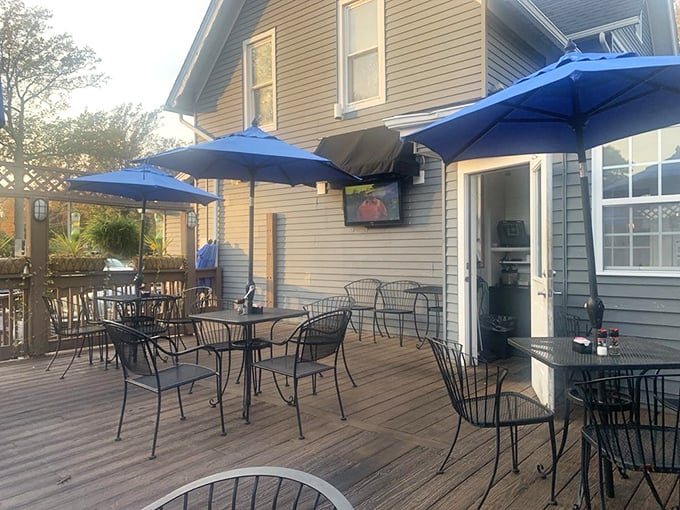 Summer evenings were made for this patio, where blue umbrellas shade tables perfect for enjoying lake breezes with your meal.