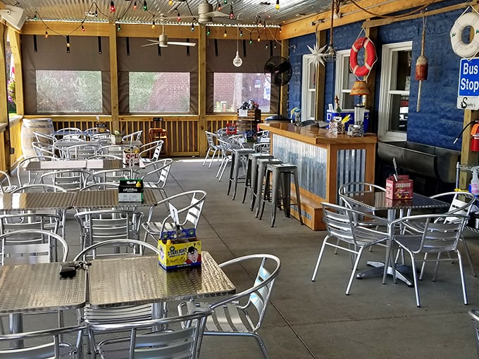 The outdoor patio—where summer breezes, cold drinks, and nautical touches remind you that Lake Erie's best offerings aren't just on your plate.