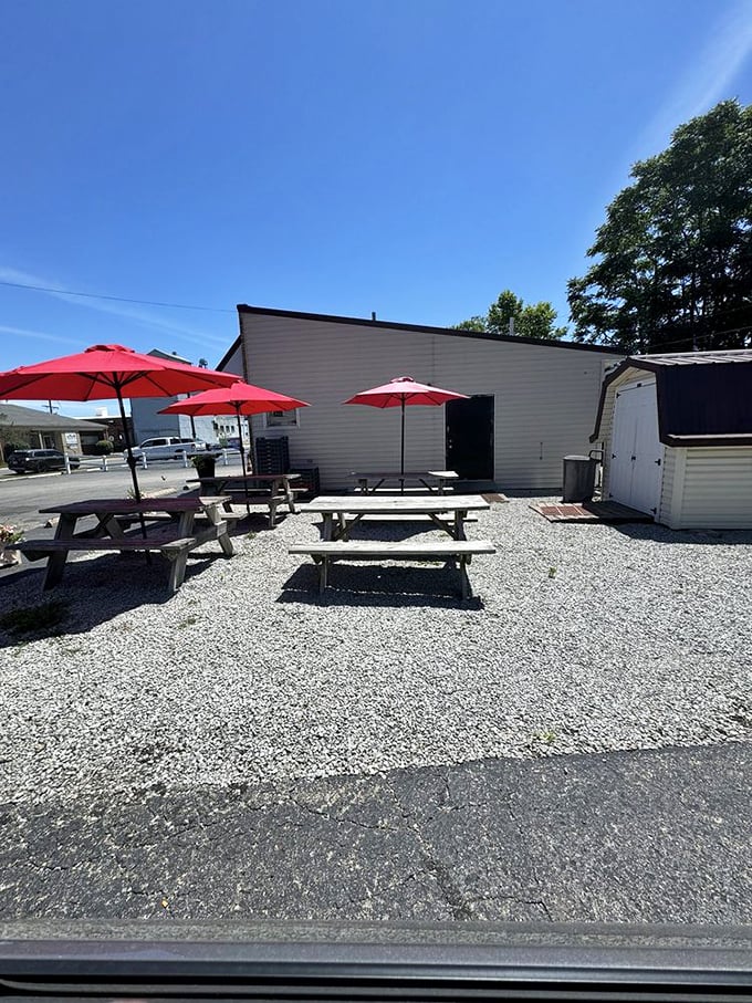 When Ohio weather cooperates, these red-umbrella-topped picnic tables become prime real estate for enjoying your Crabill's feast al fresco.