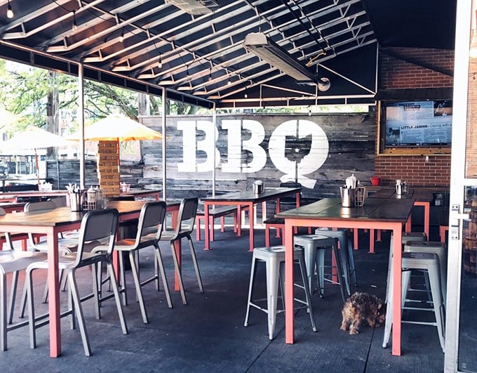 The outdoor patio's "BBQ" wall art isn't just decoration – it's a beacon calling hungry downtown Columbus wanderers to their smoky salvation.