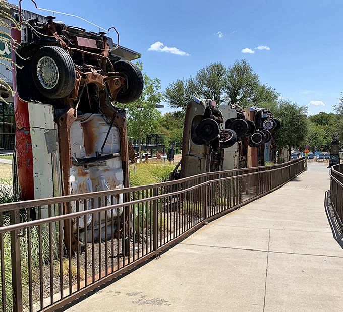 Automotive art takes on new meaning with these vertically mounted cars creating a surreal roadside attraction outside the museum.