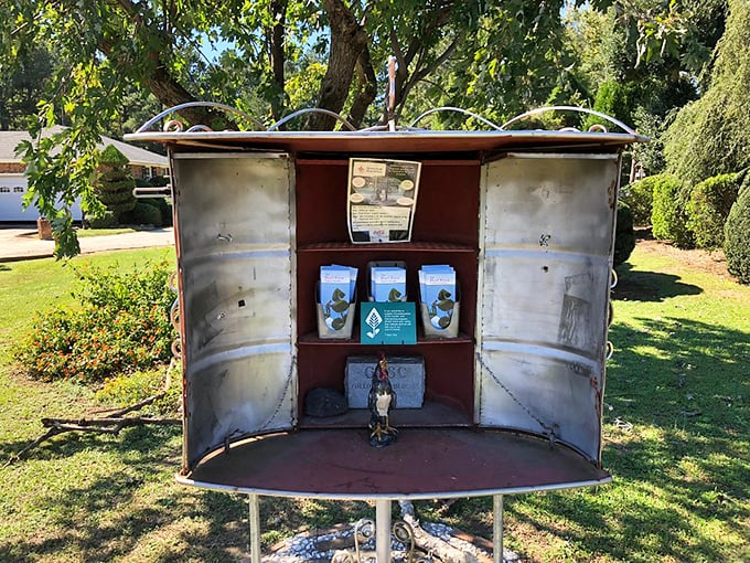 Even the information display becomes art here—housed in a repurposed metal container that complements the garden's blend of natural and industrial elements.