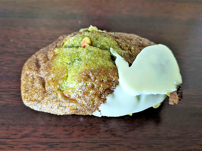 The humble pistachio madeleine hides its complexity beneath a modest exterior, much like that friend who's secretly a genius but never brags about it.