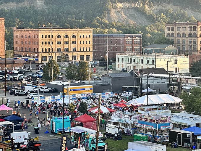 Portsmouth River Days transforms the riverfront into a carnival of tents, treats, and community celebration, viewed here from a perfect birds-eye perspective.