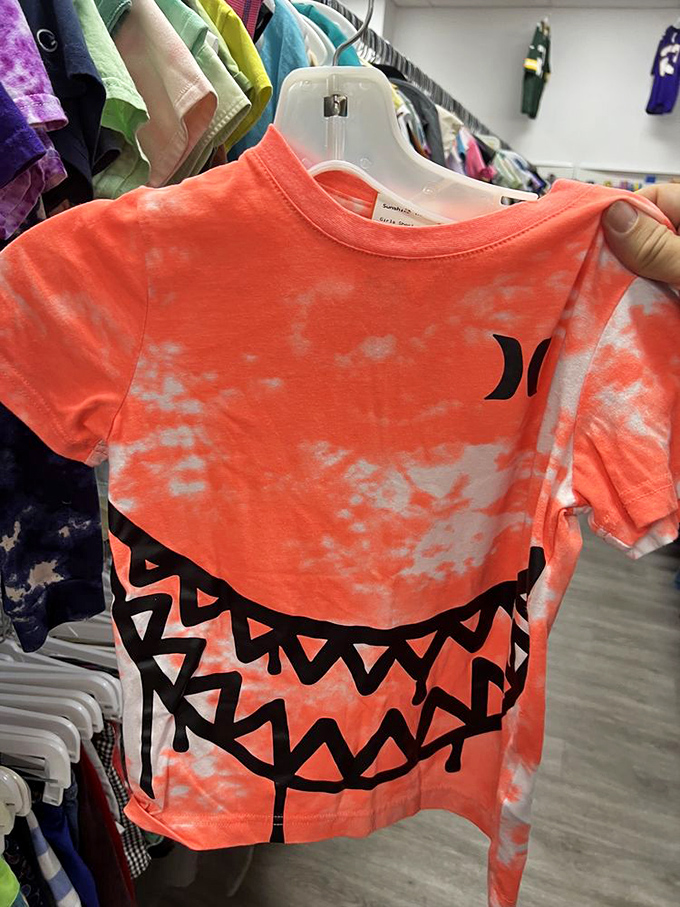 This tie-dyed shark shirt proves thrifting is where fashion meets fun. Someone's outgrown treasure becomes your conversation-starting wardrobe staple.