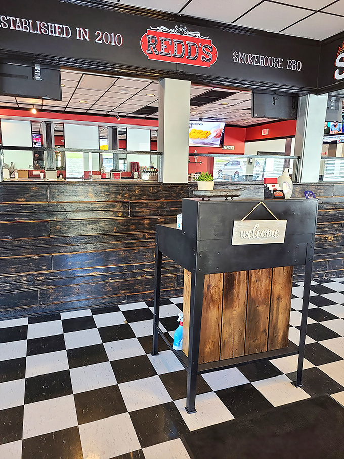 The "welcome" sign isn't just polite – it's an honest promise of what's to come when you cross that checkered floor