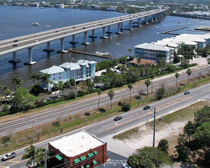 The Roosevelt Bridge stretches across blue waters, connecting mainland Stuart to its barrier island beaches – infrastructure that actually enhances the view!
