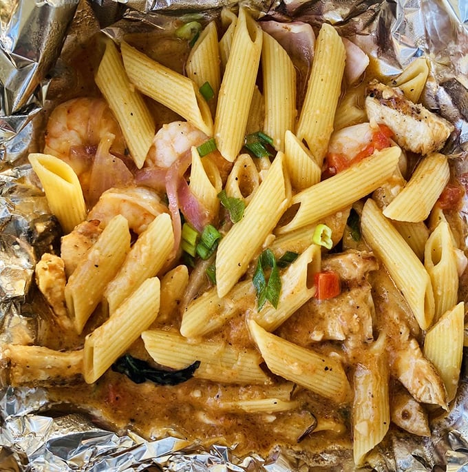 Pasta that doesn't just sit on the plate—it tells a story. Each bite of this shrimp and chicken penne delivers a perfect harmony of flavors.