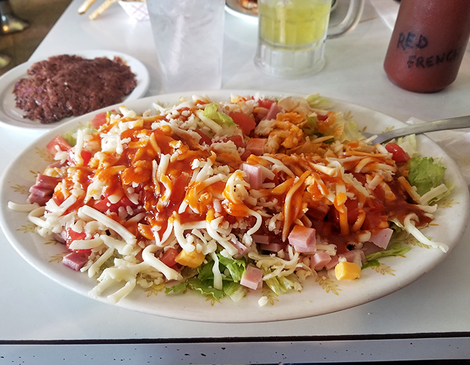 A chef salad that defies expectations—generous, colorful, and proof that even at a burger joint, vegetables can have their moment to shine.