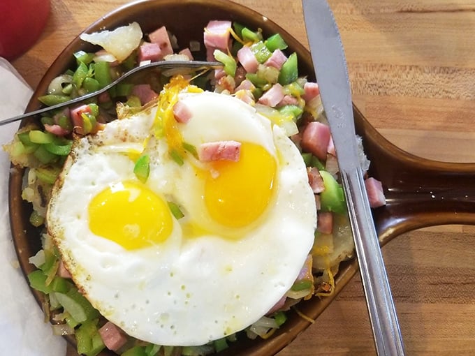 The Sierra Sunrise skillet doesn't just feed you—it tells a delicious story with eggs, ham, and veggies playing all the leading roles.