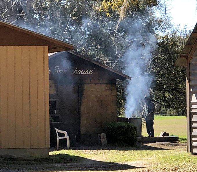 The smokehouse—where magic happens in slow motion and patience is rewarded with flavors that no "quick marinade" could ever achieve.