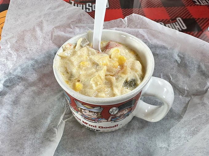 This isn't just soup—it's a warm, creamy hug in a mug, served with a side of nostalgia in classic diner dishware.