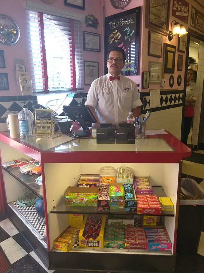 The staff doesn't just serve food—they're custodians of tradition, complete with bow ties that haven't changed since Buddy Holly topped charts.
