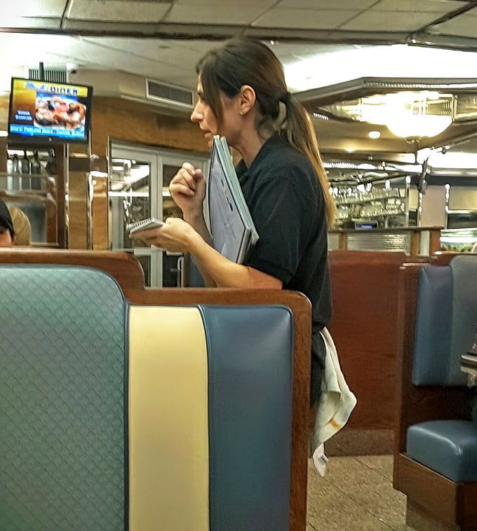 The unsung heroes of the diner experience—efficient, friendly staff who remember your usual order before you've fully settled in.