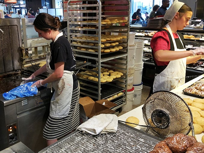 Artisans at work: Beiler's staff crafting each donut with care and precision. This is what dedication to the craft looks like.