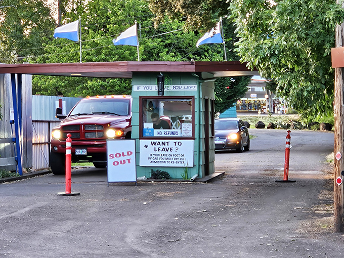 "If you leave, you left"—the exit booth's no-nonsense policy delivered with small-town charm and a touch of drive-in wisdom. 