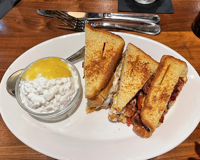 This sandwich doesn't just stack ingredients—it builds flavor architecture that would make Frank Lloyd Wright put down his blueprints and pick up a fork.