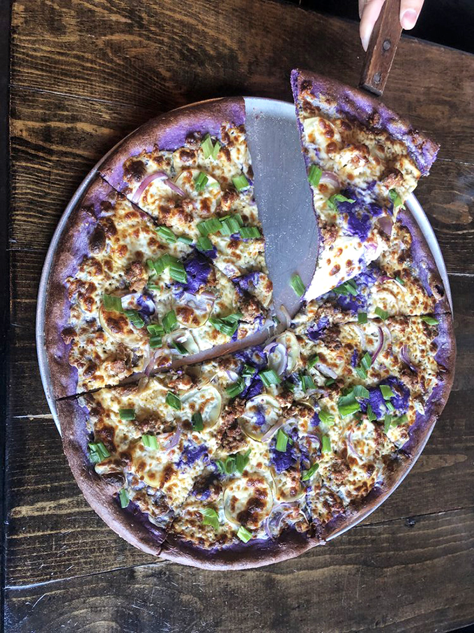 The purple-hued Ube pizza isn't just Instagram bait—it's a brilliant fusion of Filipino flavors that proves pizza evolution is alive and well.