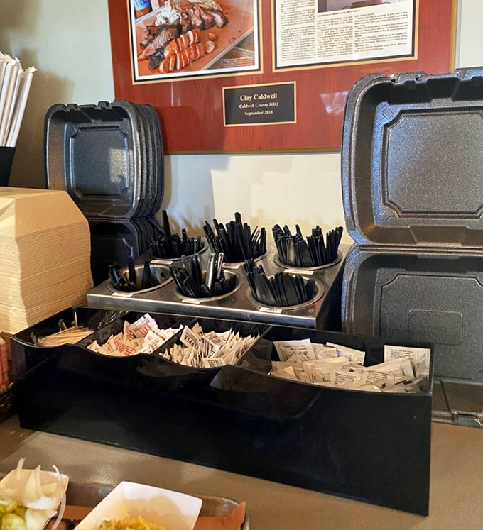 Even the utensil station shows attention to detail—because proper barbecue demands proper tools for the delicious task ahead.