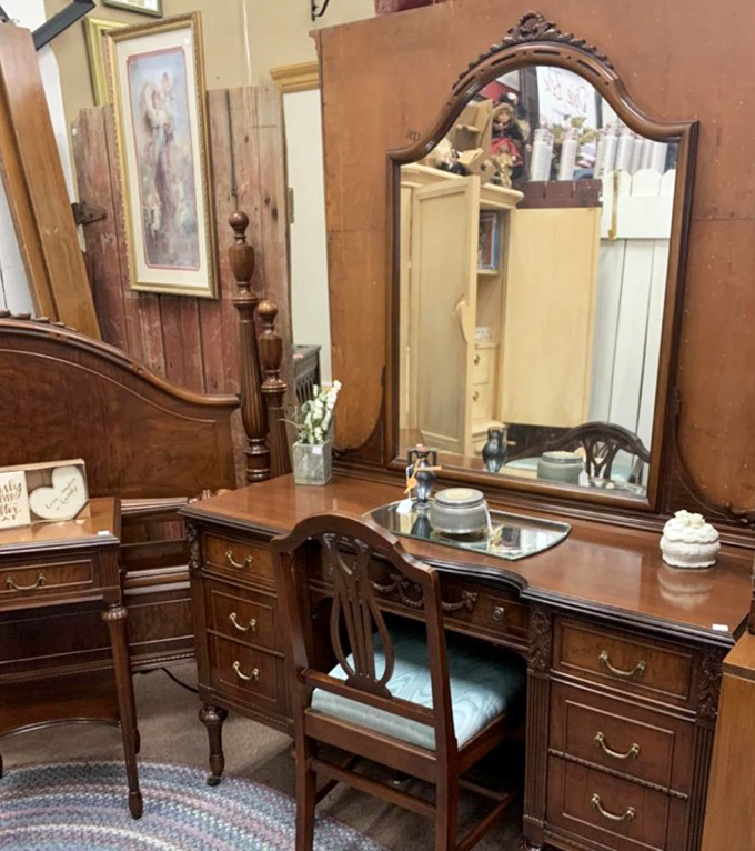Vanity table that whispers tales of morning rituals from decades past – when getting ready was an event, not just something you rushed through. 