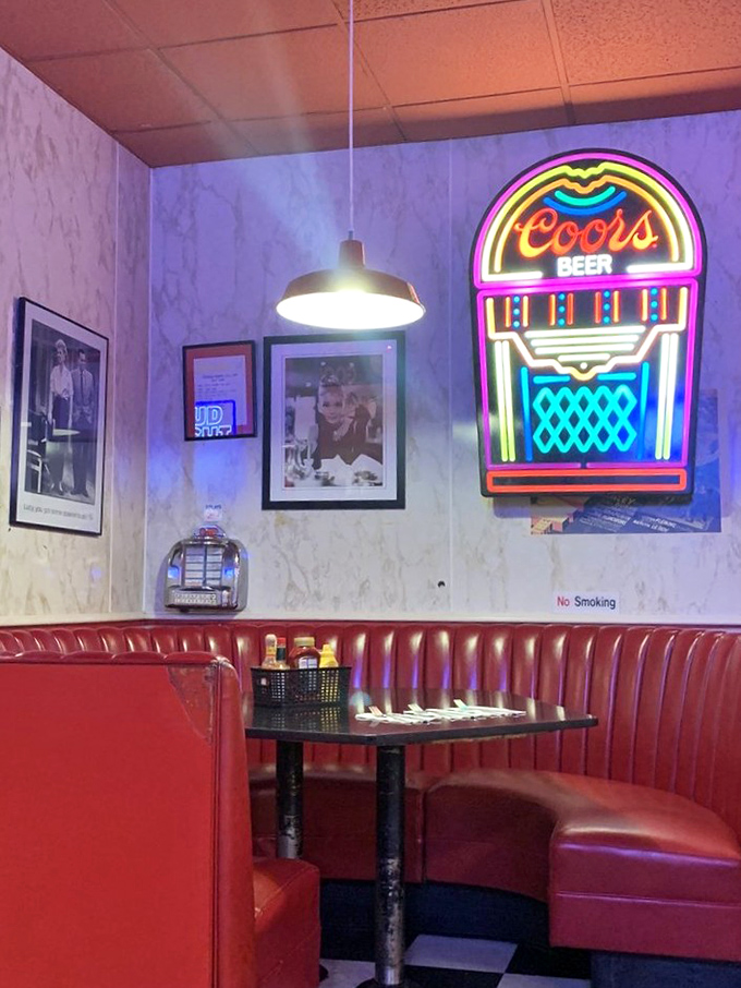 The neon glow of vintage signs isn't just decoration—it's a beacon calling you home to a simpler time when calories weren't counted.