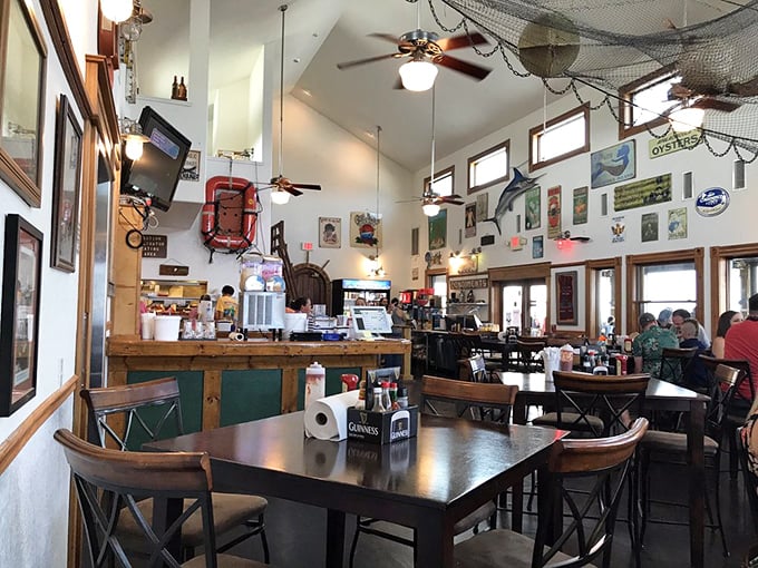 The dining room buzzes with conversation and laughter, while maritime treasures watch over happy diners from every wall.