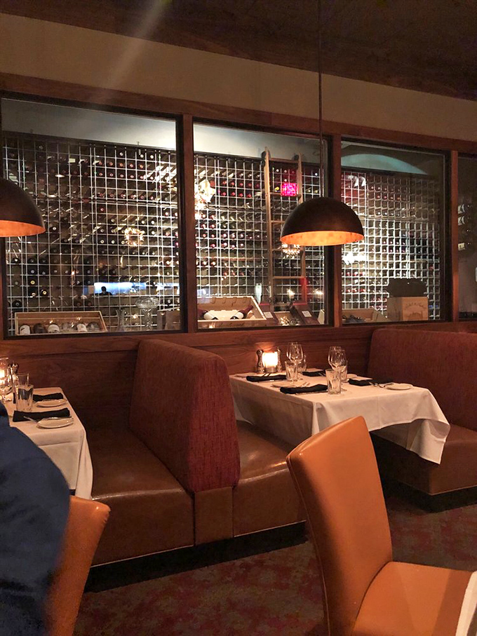 The wine display isn't just storage—it's a gallery exhibition where every bottle tells a story waiting to be uncorked.