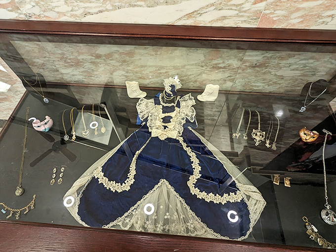 This elegant display of cat-themed jewelry proves that feline fashion has been enhancing human wardrobes long before cat memes ruled the internet.