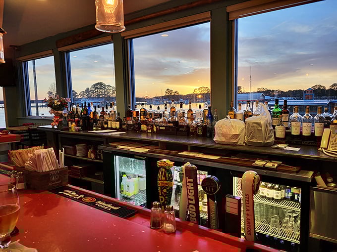 This isn't just a bar view—it's nature's perfect backdrop for sipping something cold while watching the day melt into golden-hour perfection over Kent Narrows.
