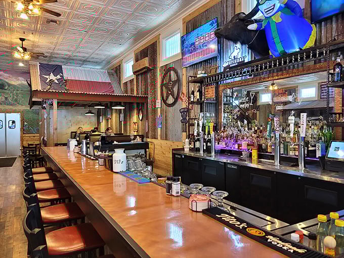 The bar where strangers become friends and friends become family. Those Texas flags aren't decorations – they're declarations of delicious intent.