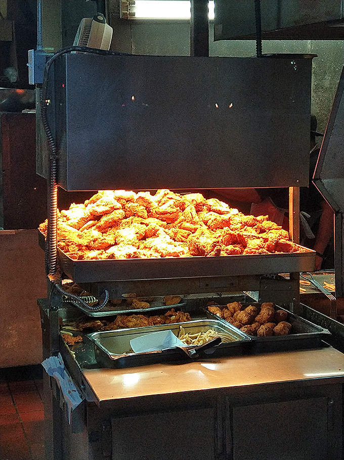 This isn't just a batch of fried chicken—it's edible gold, each piece a testament to the art of perfect frying and seasoning.