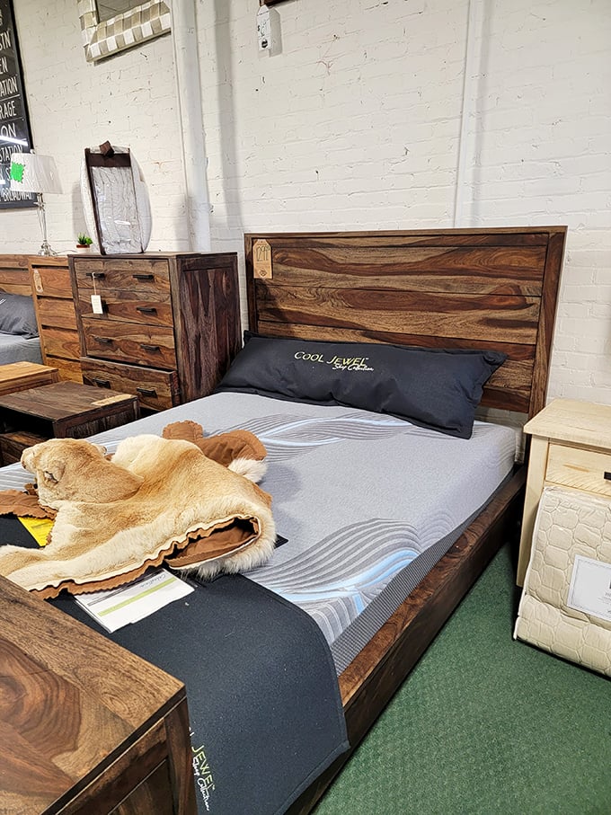This wooden bedroom set whispers sweet dreams of craftsmanship, complete with cowhide throws for rustic sleeping elegance.