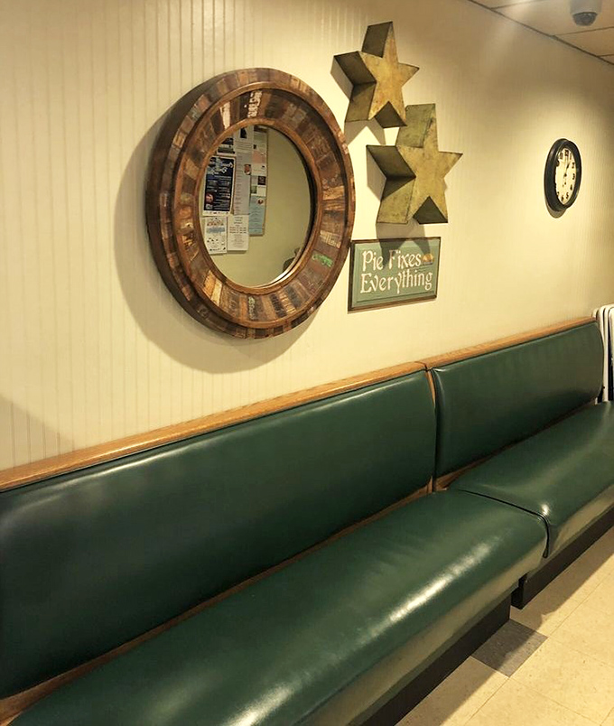 That "Pie Fixes Everything" sign isn't just decoration—it's the restaurant's philosophy in three perfect words. The green booths have cradled generations of diners.