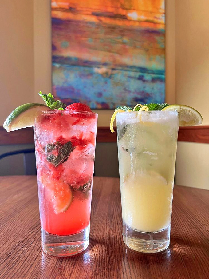 These aren't just cocktails, they're liquid vacations—strawberry refreshment and citrus revival in glasses tall enough to hide your phone.